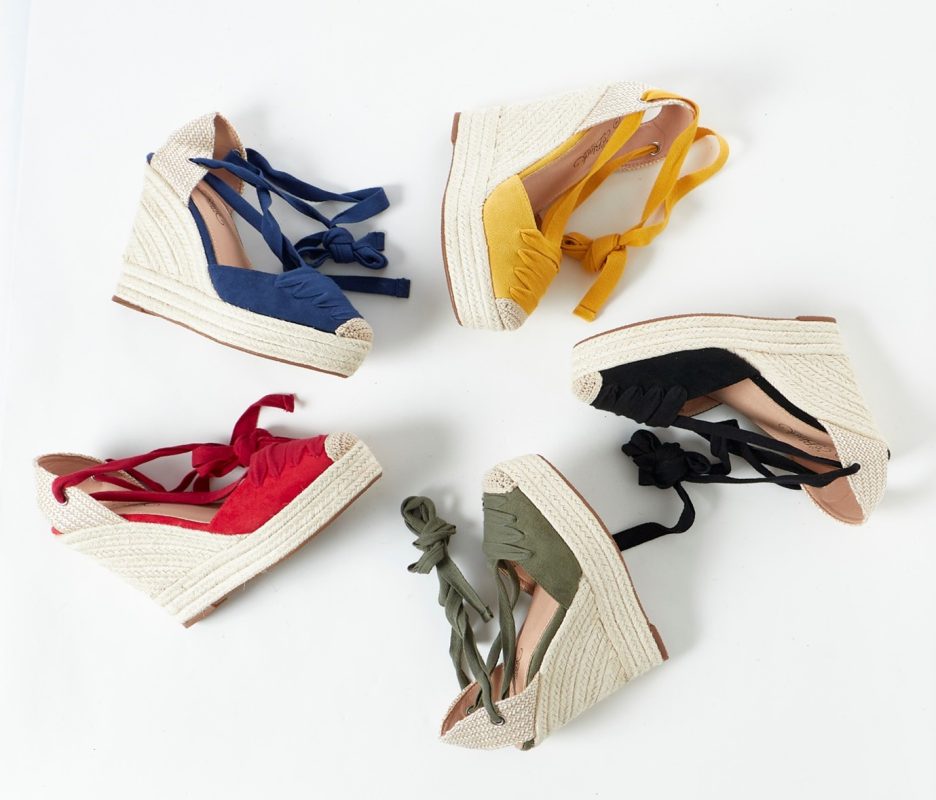 What is the appeal of wearing wedge shoes?